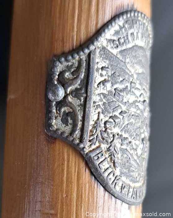 German wooden cane with metal emblem, 35" | Maxsold