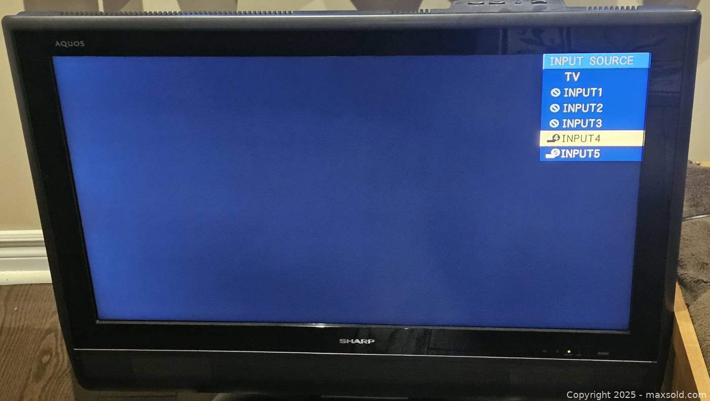 Sharp Aquos 37" television with remote | Maxsold