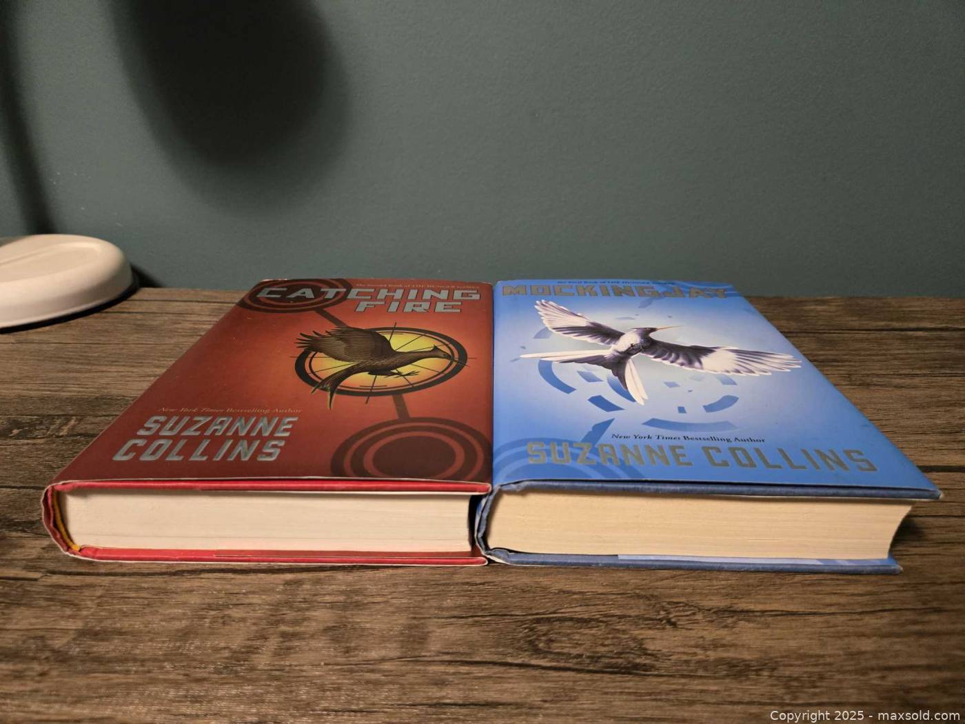 Catching Fire & Mockingjay hardcover books | Maxsold