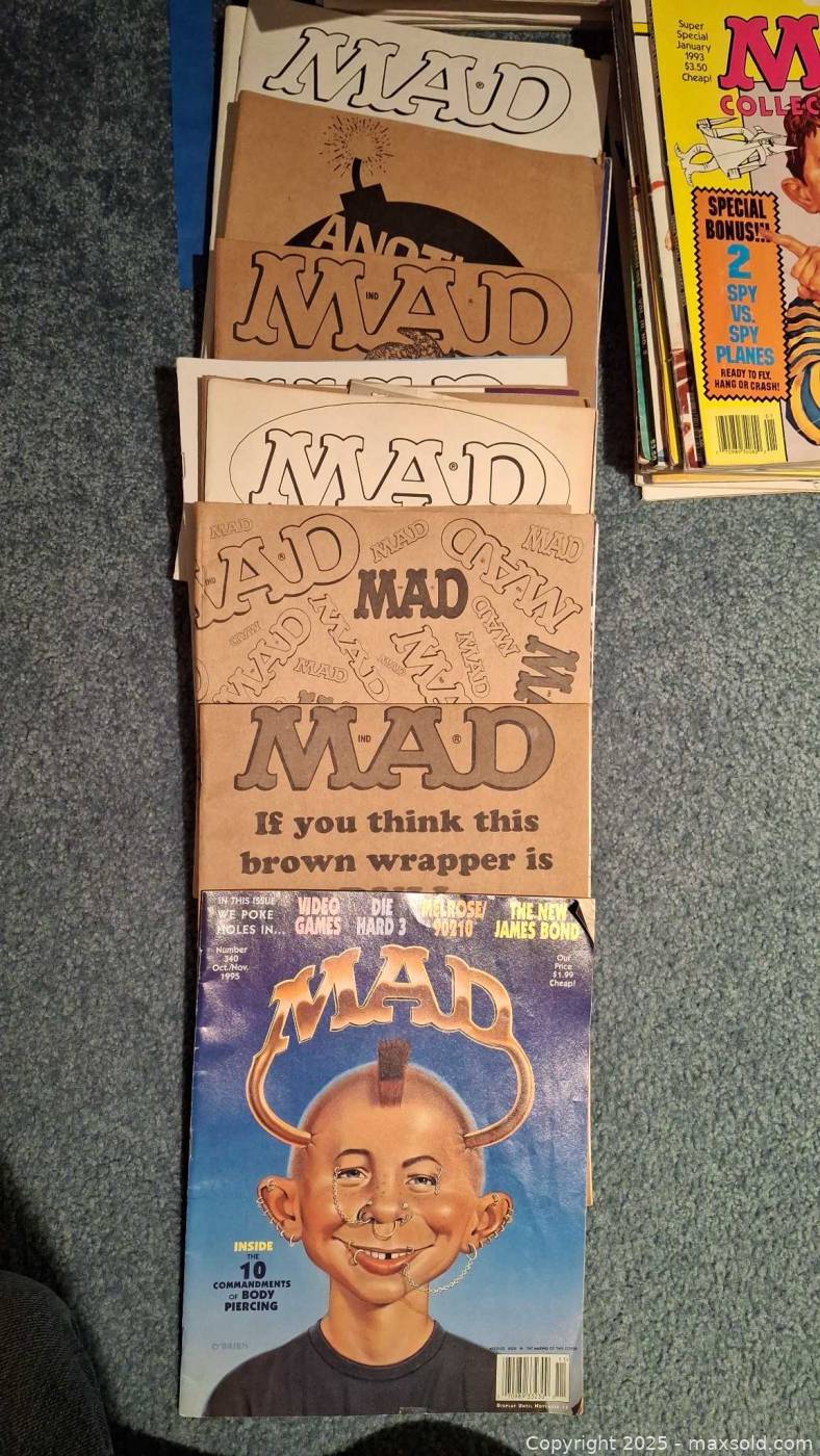 50+ MAD magazines with Superman comic & Charlie Brown book | Maxsold