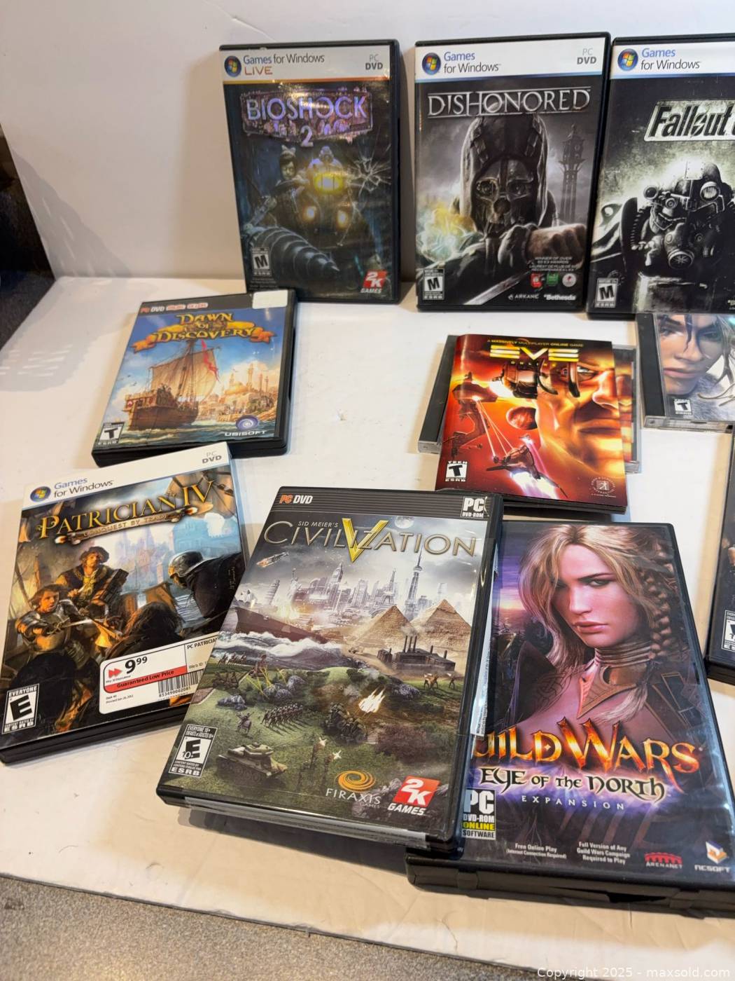 Dozen Windows PC game DVDs with codes | Maxsold