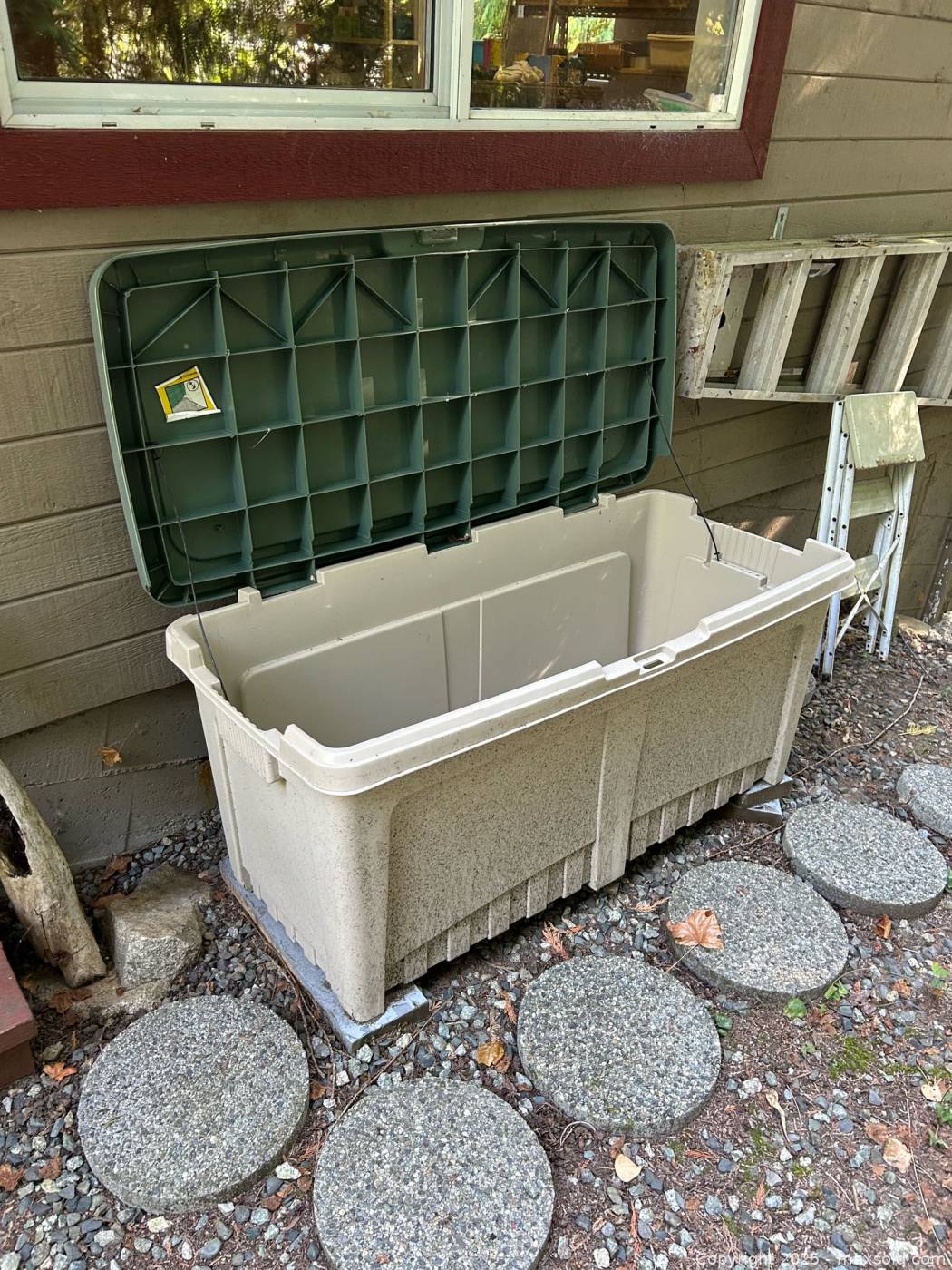 Two Rubbermaid outdoor storage totes | Maxsold