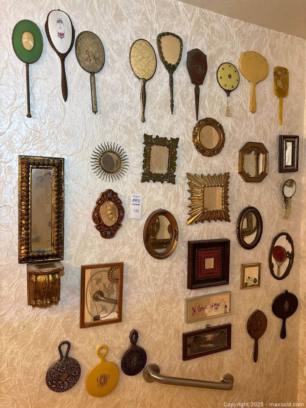 Collection of handheld and wall mirrors | Maxsold