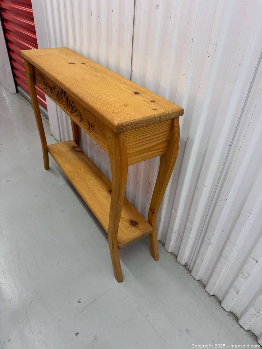 Solid pine console table with carved apron | Maxsold