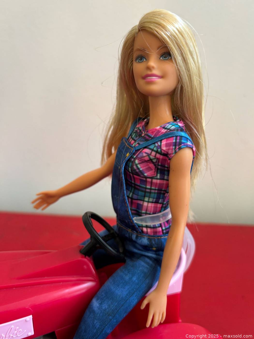 Barbie farmer doll with red tractor vehicle | Maxsold