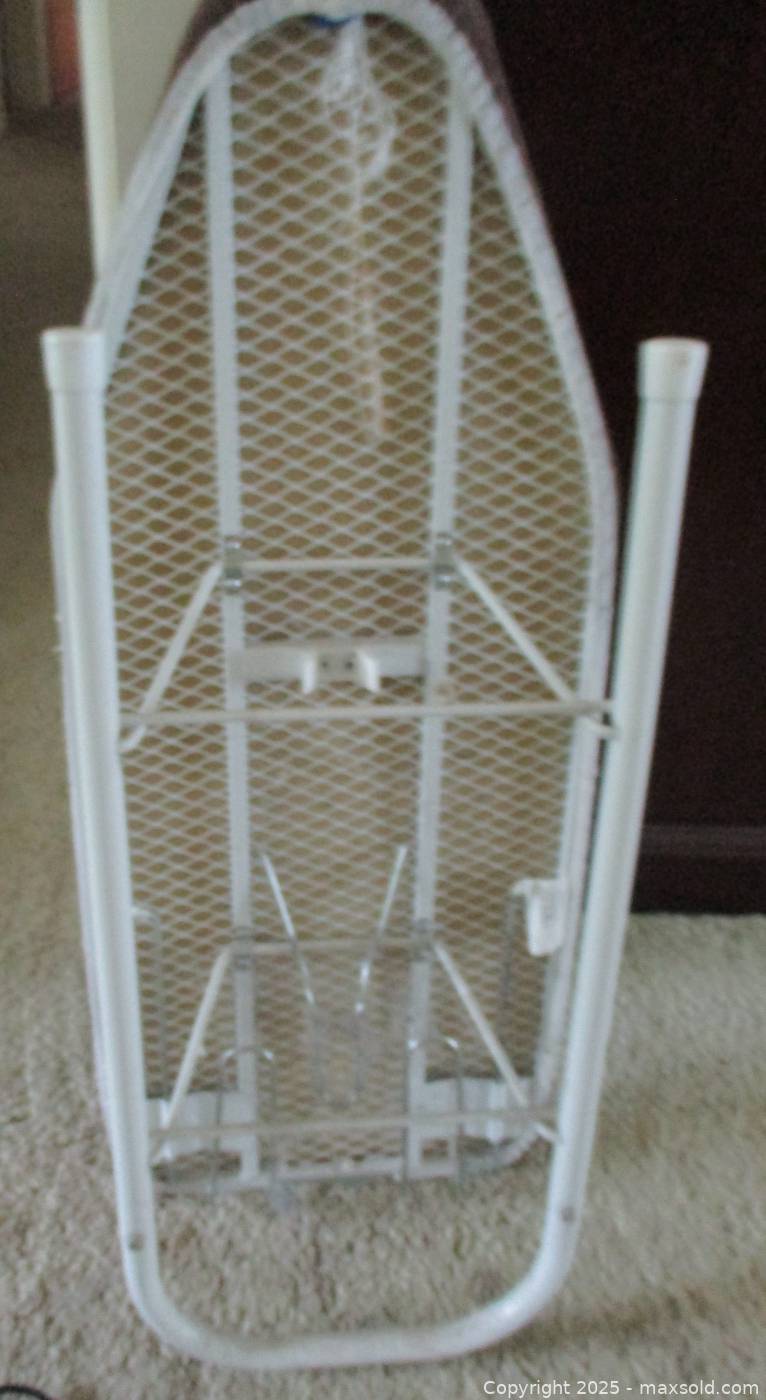 Tabletop ironing board and Rival steam iron | Maxsold