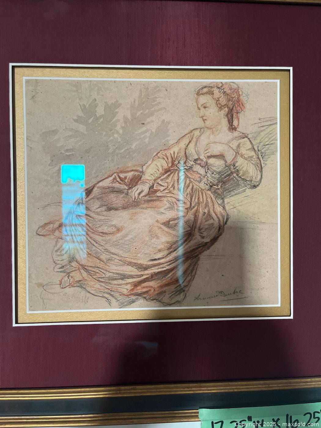 Framed signed drawing of reclining woman | Maxsold
