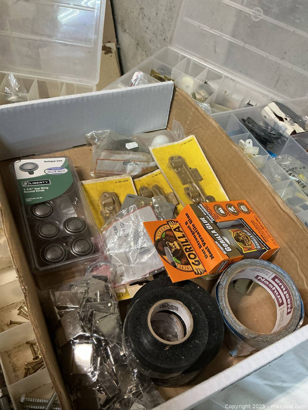 Plastic hardware organizers with mixed fasteners | Maxsold