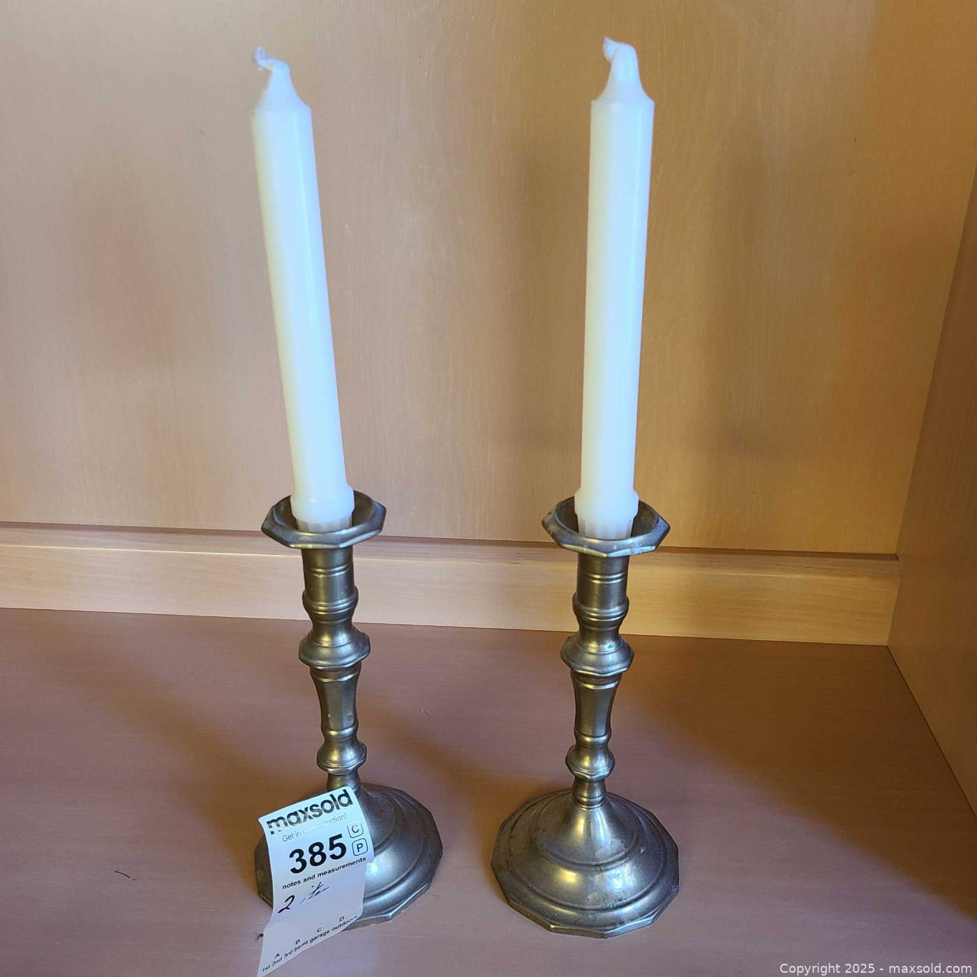 Metal candlesticks with candles and oil lamp | Maxsold