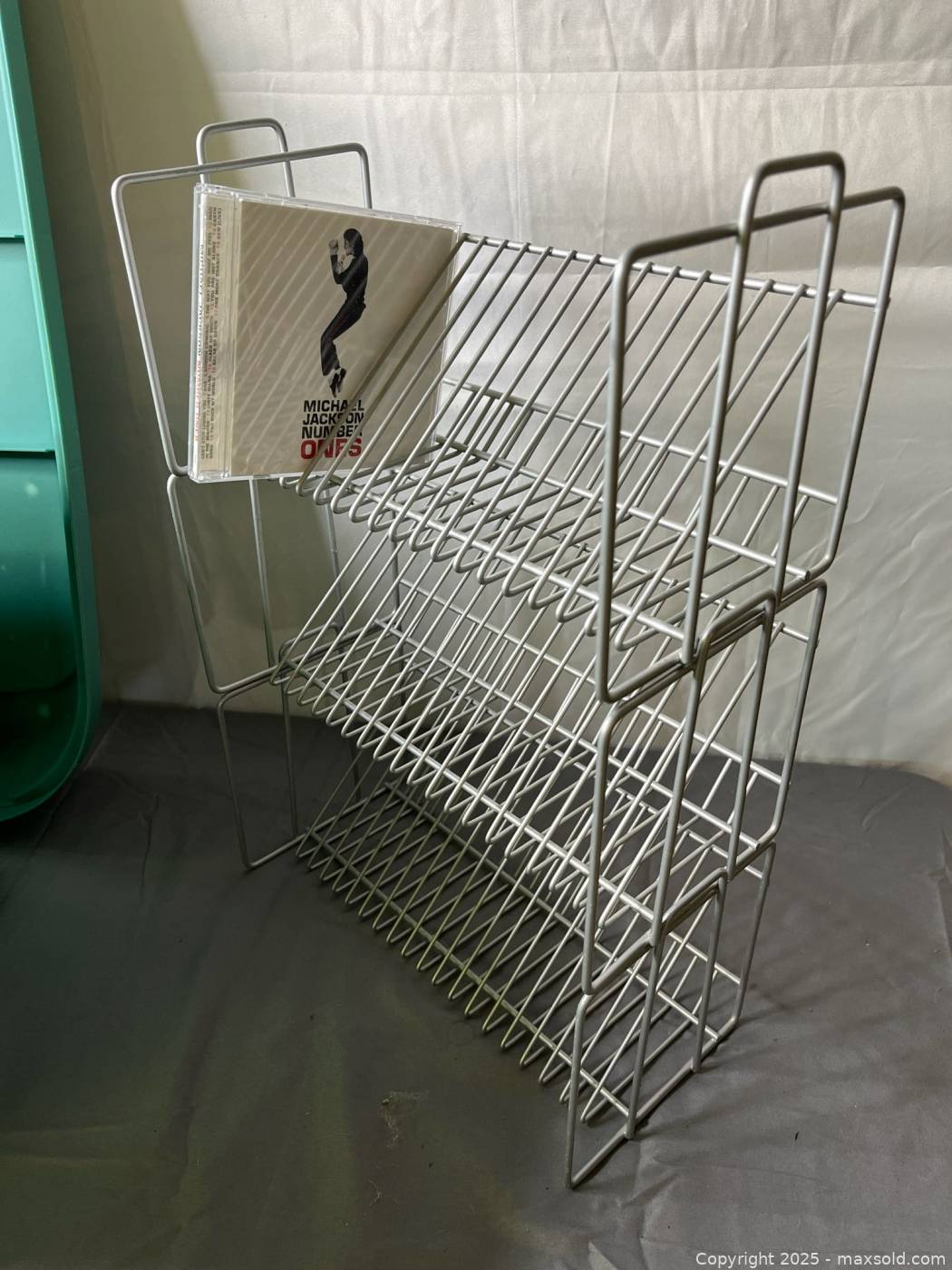 6 stackable metal CD racks with tote | Maxsold