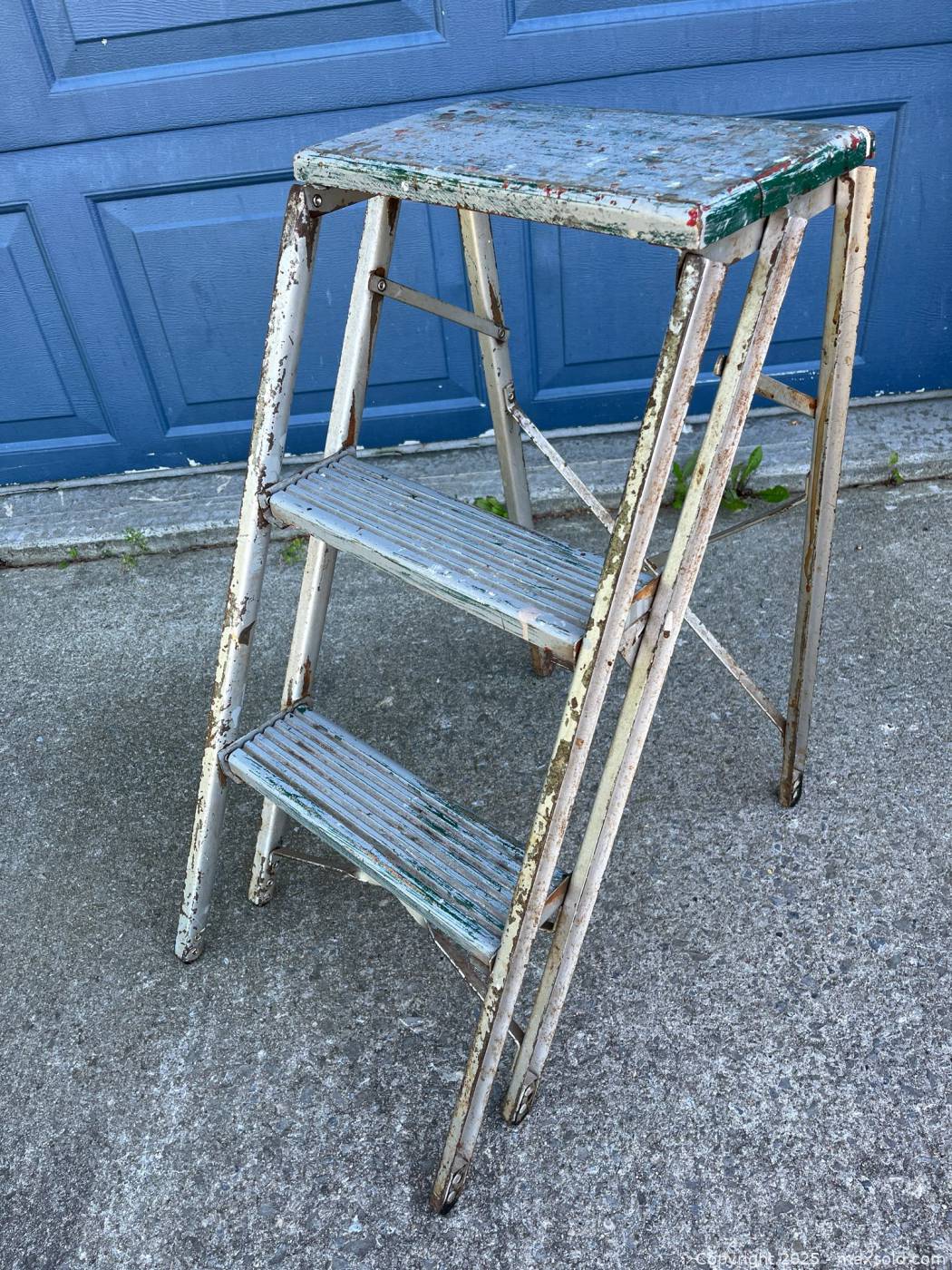 Vintage metal folding 2-step ladder | Maxsold