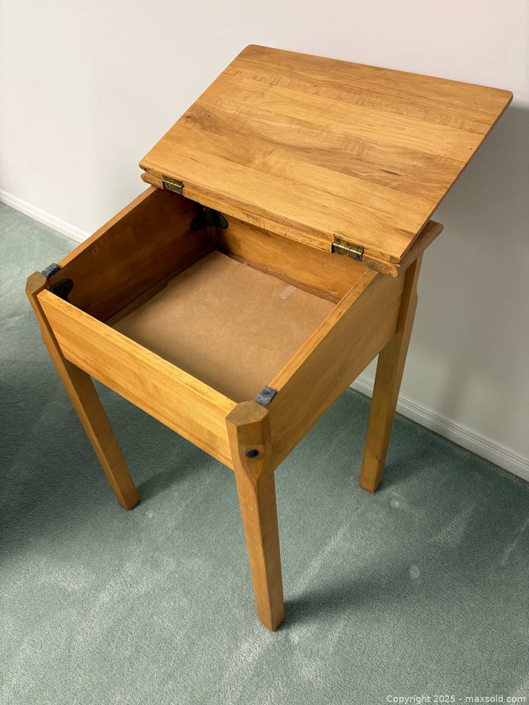 Solid wood hinged-top desk with storage | Maxsold