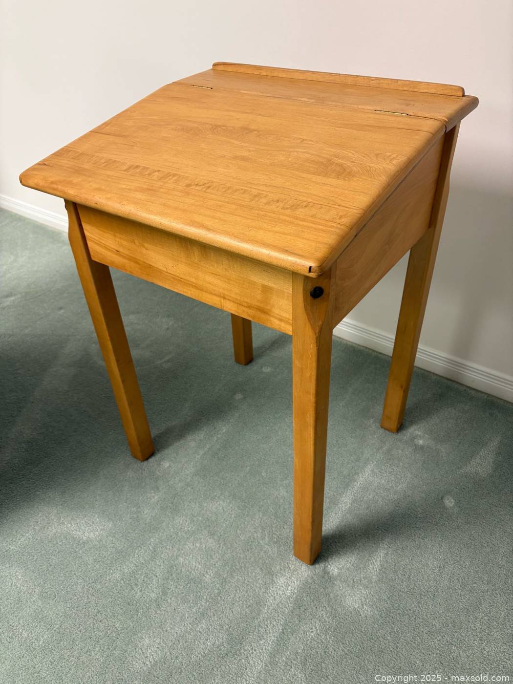 Solid wood hinged-top desk with storage | Maxsold