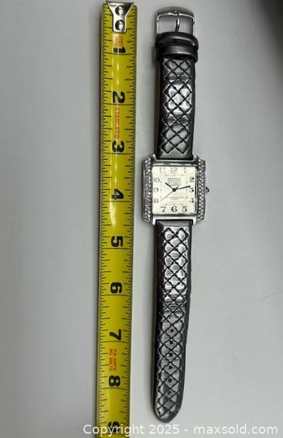 Wayne Clark quartz wristwatch | Maxsold