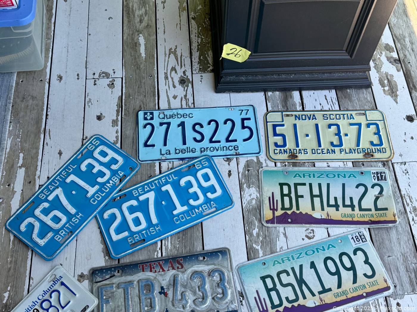 Vintage license plates & Harley-Davidson frame | Maxsold