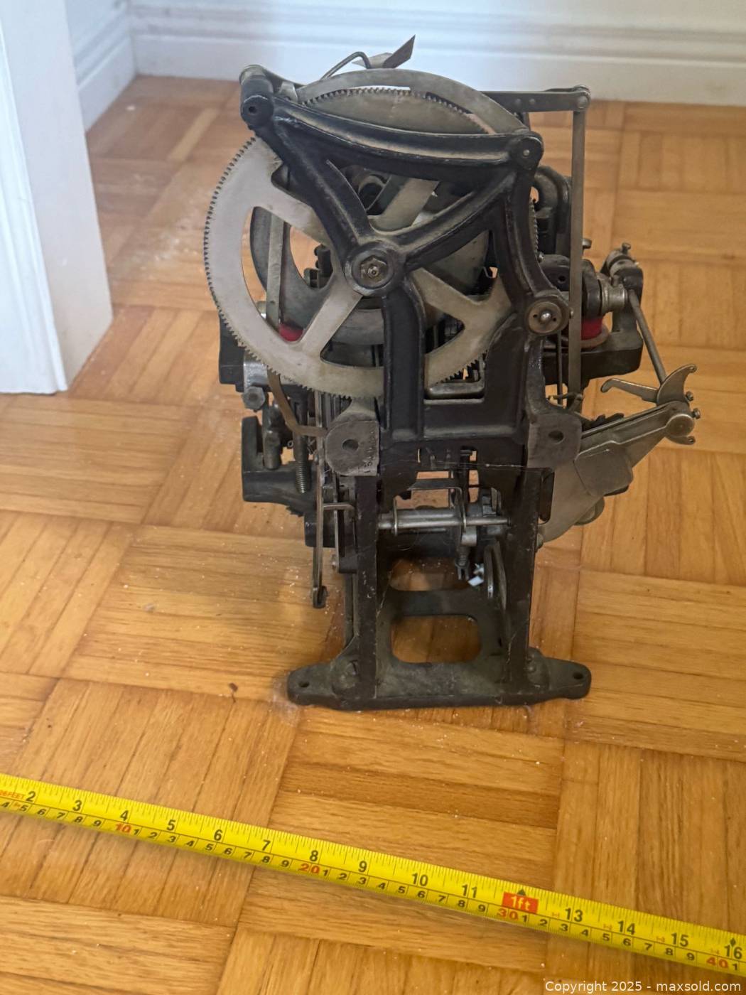 Antique mechanical punch clock mechanism | Maxsold