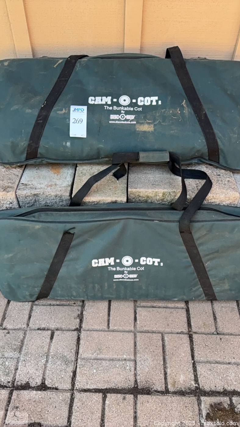 Two Cam-O-Cot bunkable cots in carry bags | Maxsold