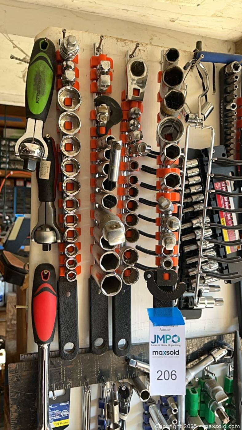 Assorted ratchets, socket rails, hand tools | Maxsold