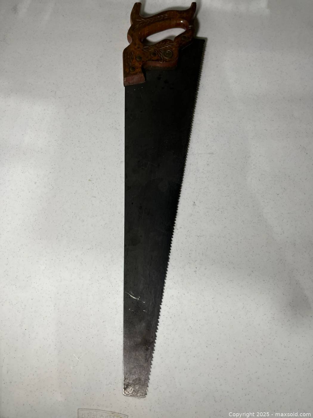 Vintage Disston rip saw carved handle | Maxsold