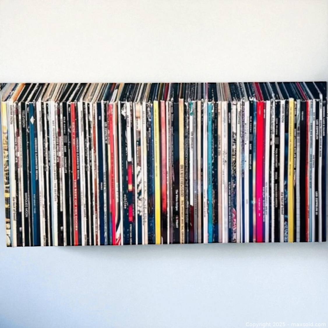 Rectangular 3-D vinyl album spine wall art 40" x 20" | Maxsold