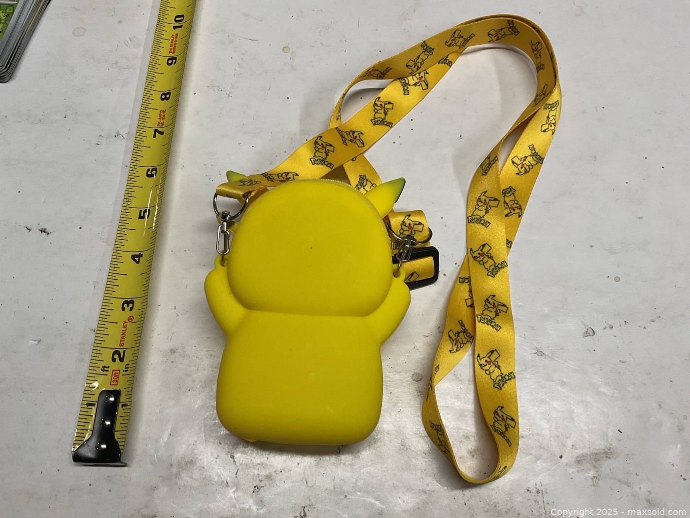 Pokémon Pikachu silicone purse with lanyard | Maxsold