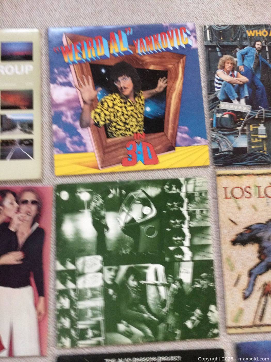 10 collectible rock LP vinyl records | Maxsold