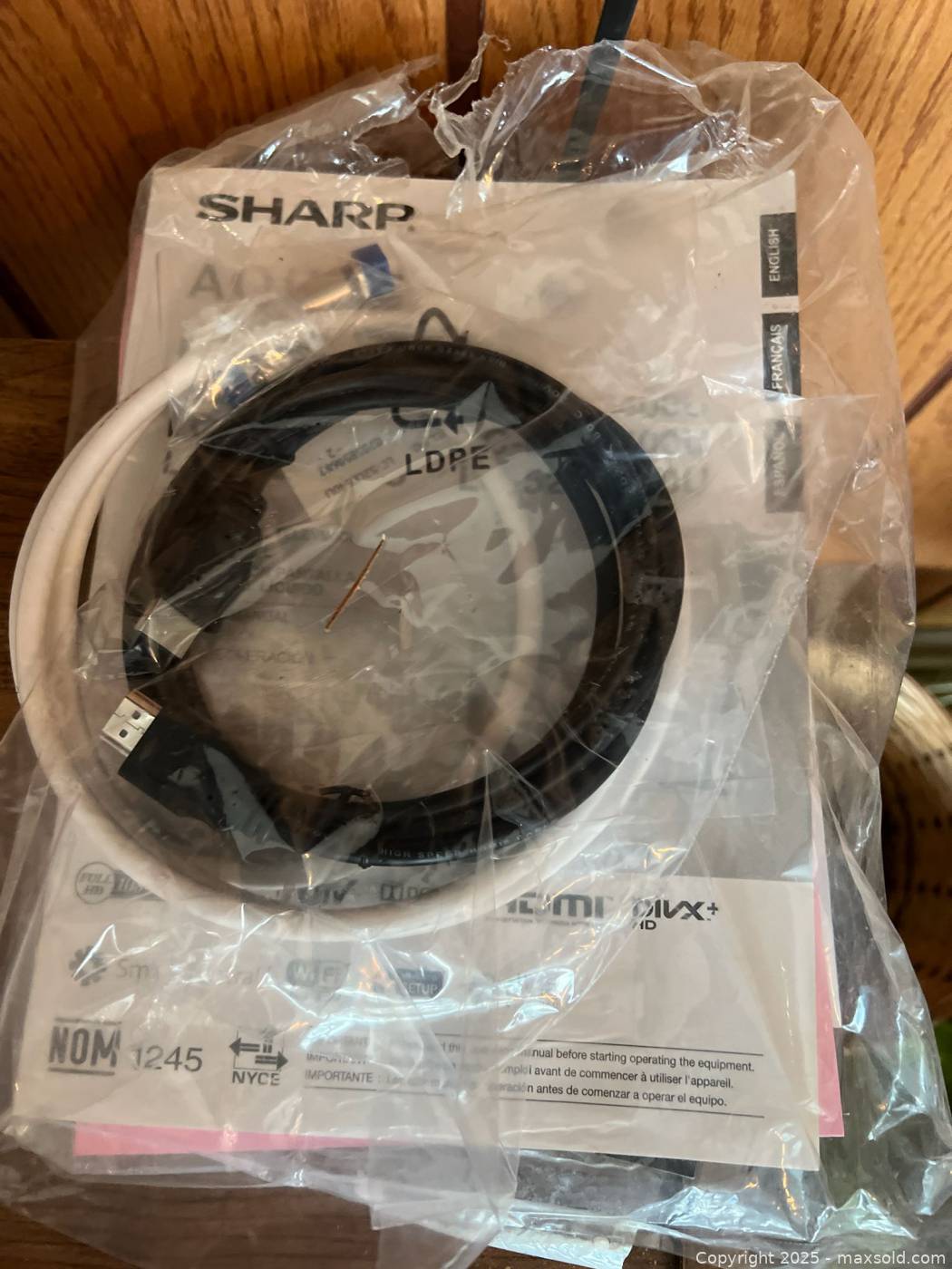 Sharp 52" flat screen TV with remote, manual, HDMI and coaxial cables ...