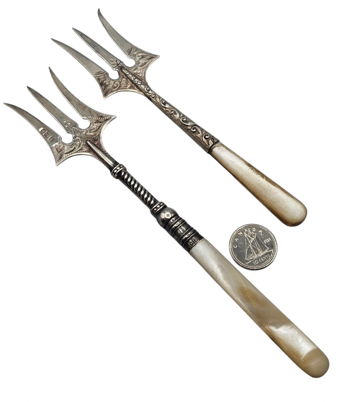 Two antique three-tine serving forks | Maxsold