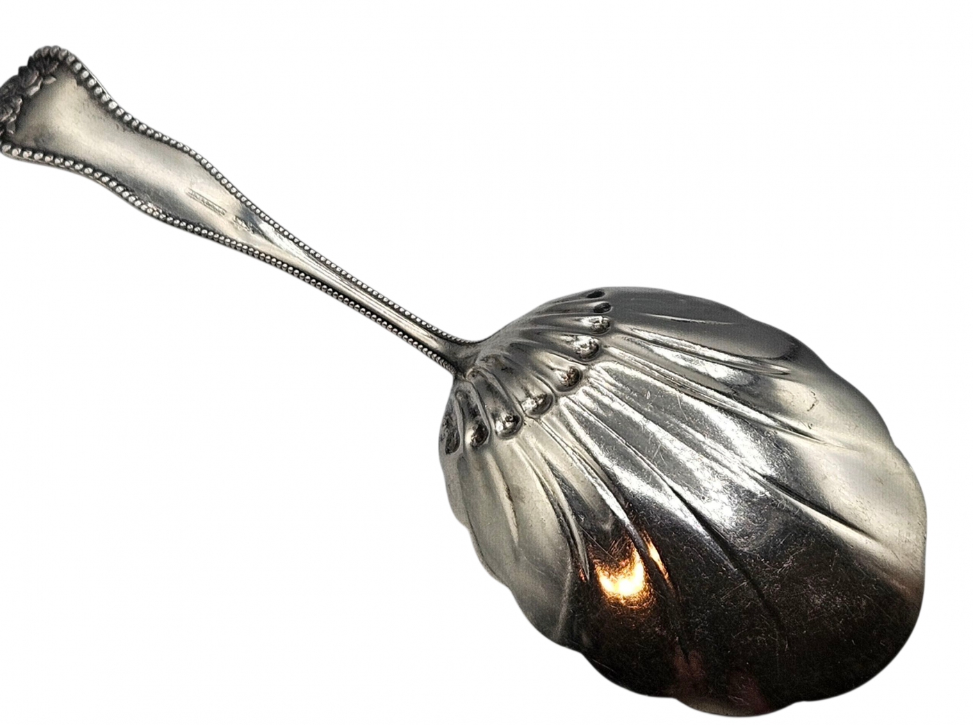 Sterling silver shell-form serving spoon | Maxsold