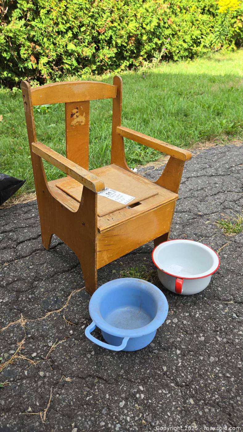 Antique wooden child’s potty chair with enamel and plastic pots | Maxsold