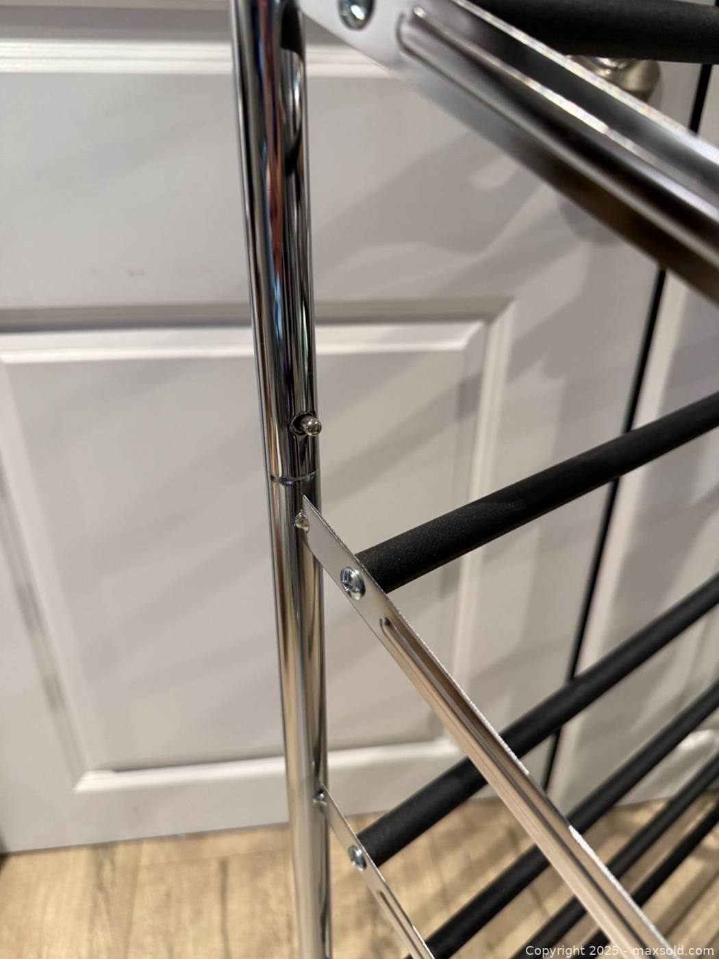 Chrome rolling shoe tower rack | Maxsold