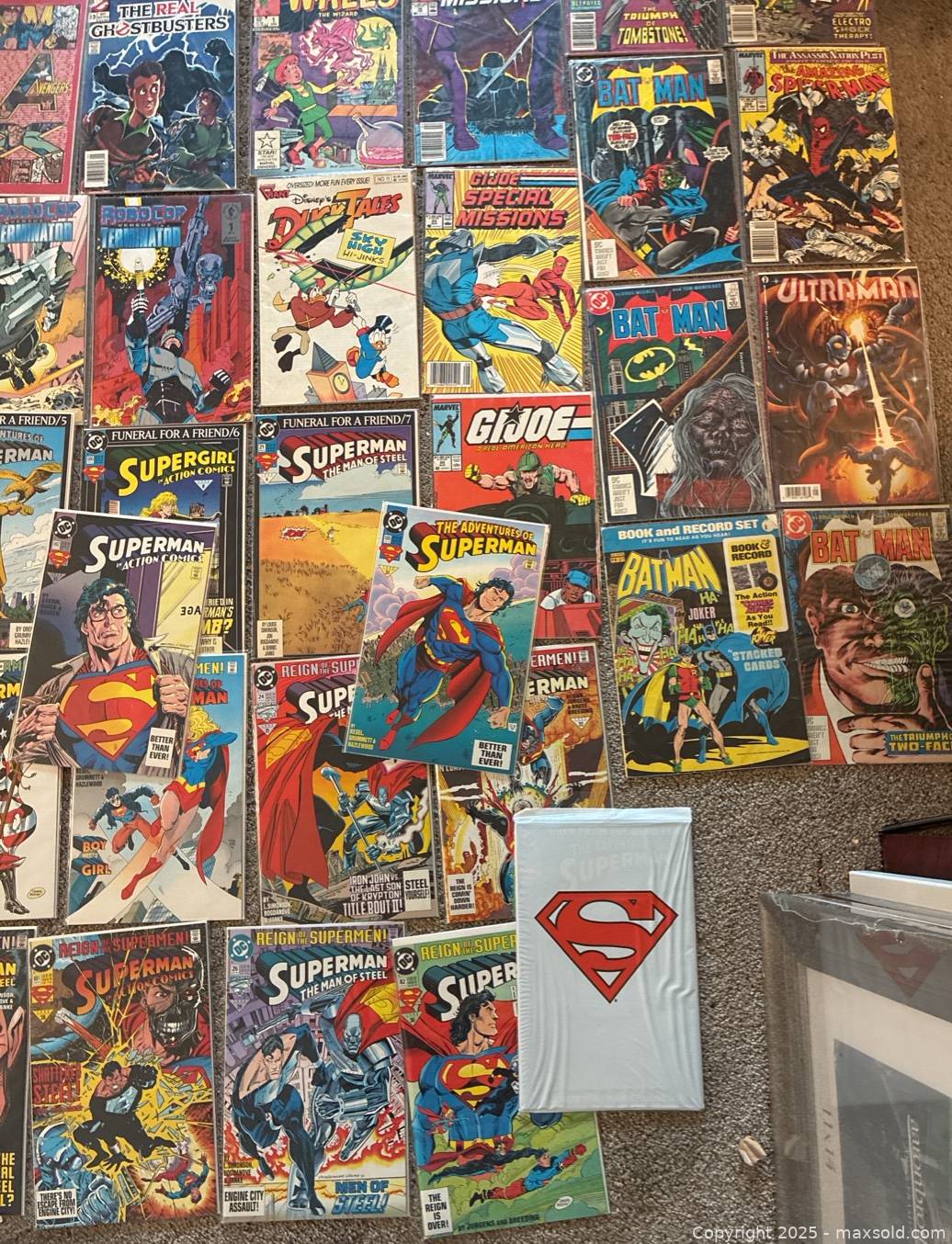 64 bagged comic books Superman Batman etc | Maxsold