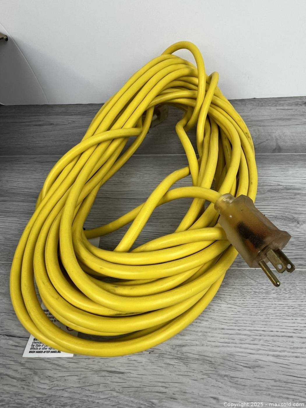 Yellow heavy-duty outdoor extension cord | Maxsold