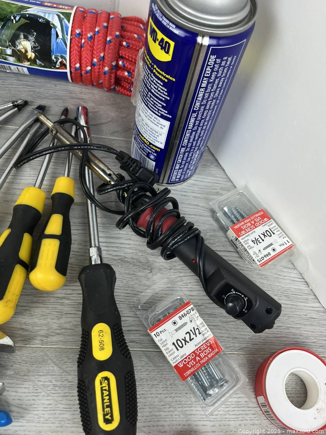 Assorted hand tools, fasteners, adhesives | Maxsold