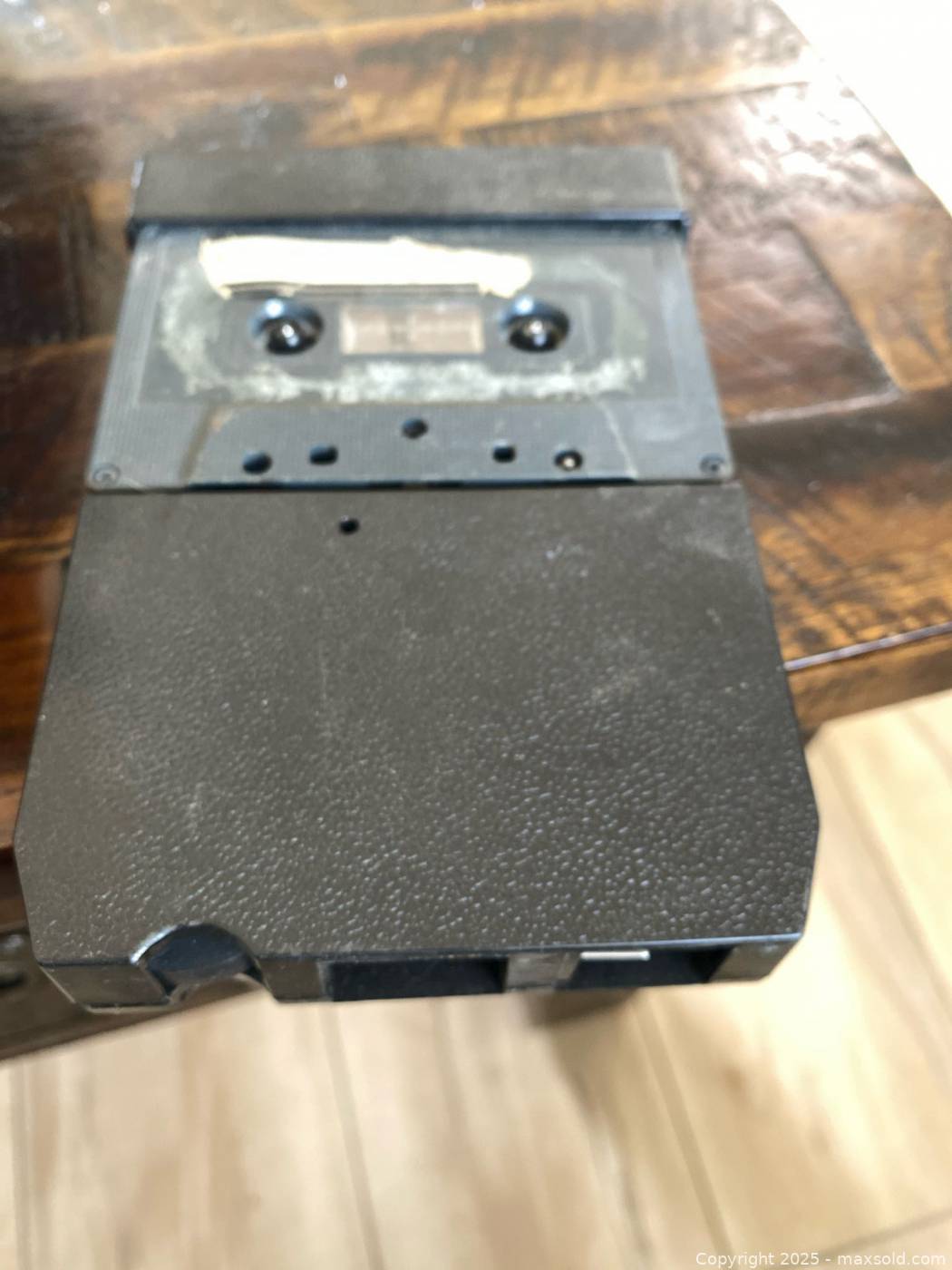 20 8-track tapes, storage rack, cassette adapter | Maxsold