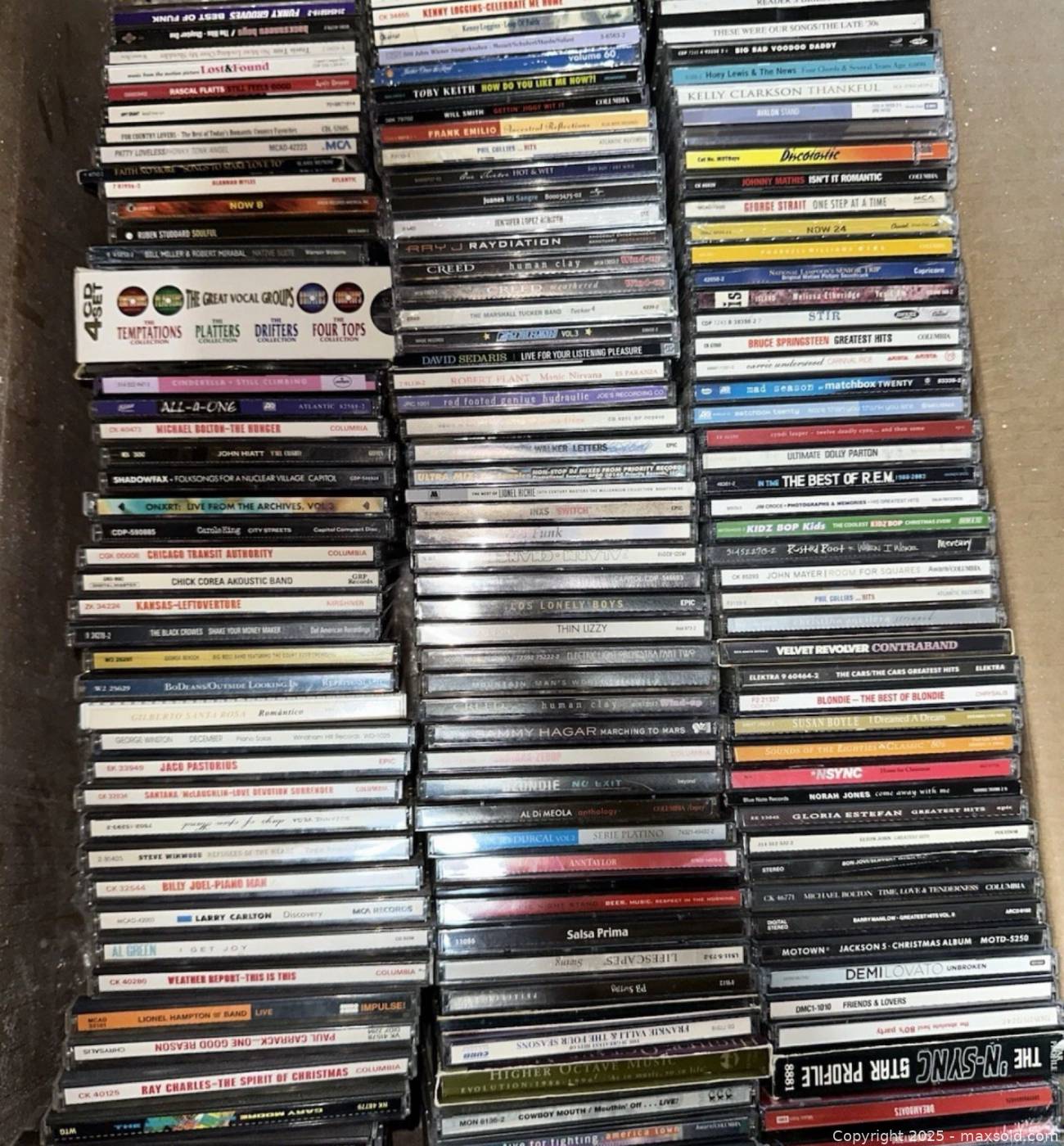 Approx 100 music CDs with storage cabinet | Maxsold