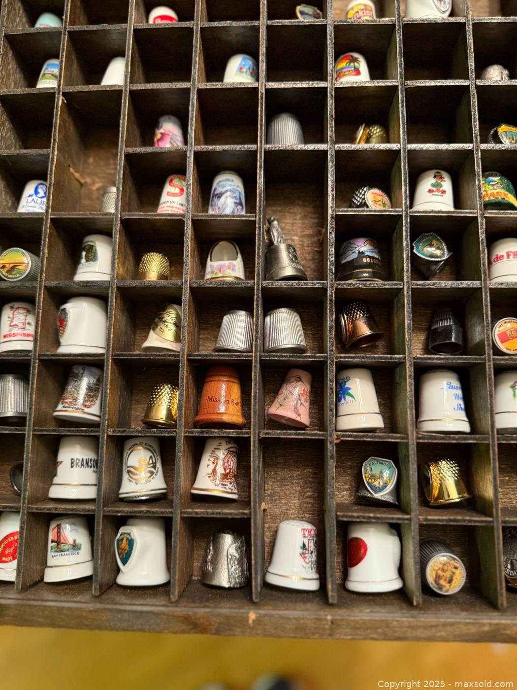 Vintage thimble collection with wooden display case | Maxsold