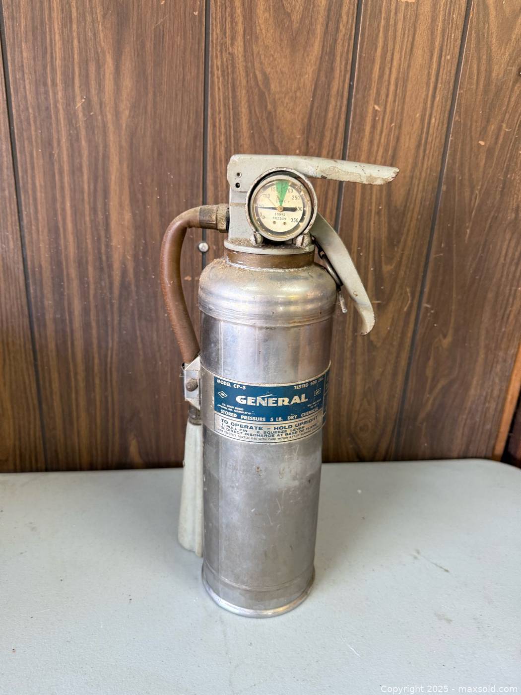 1960 General CP-10 Stainless Dry Chemical Fire Extinguisher | Maxsold