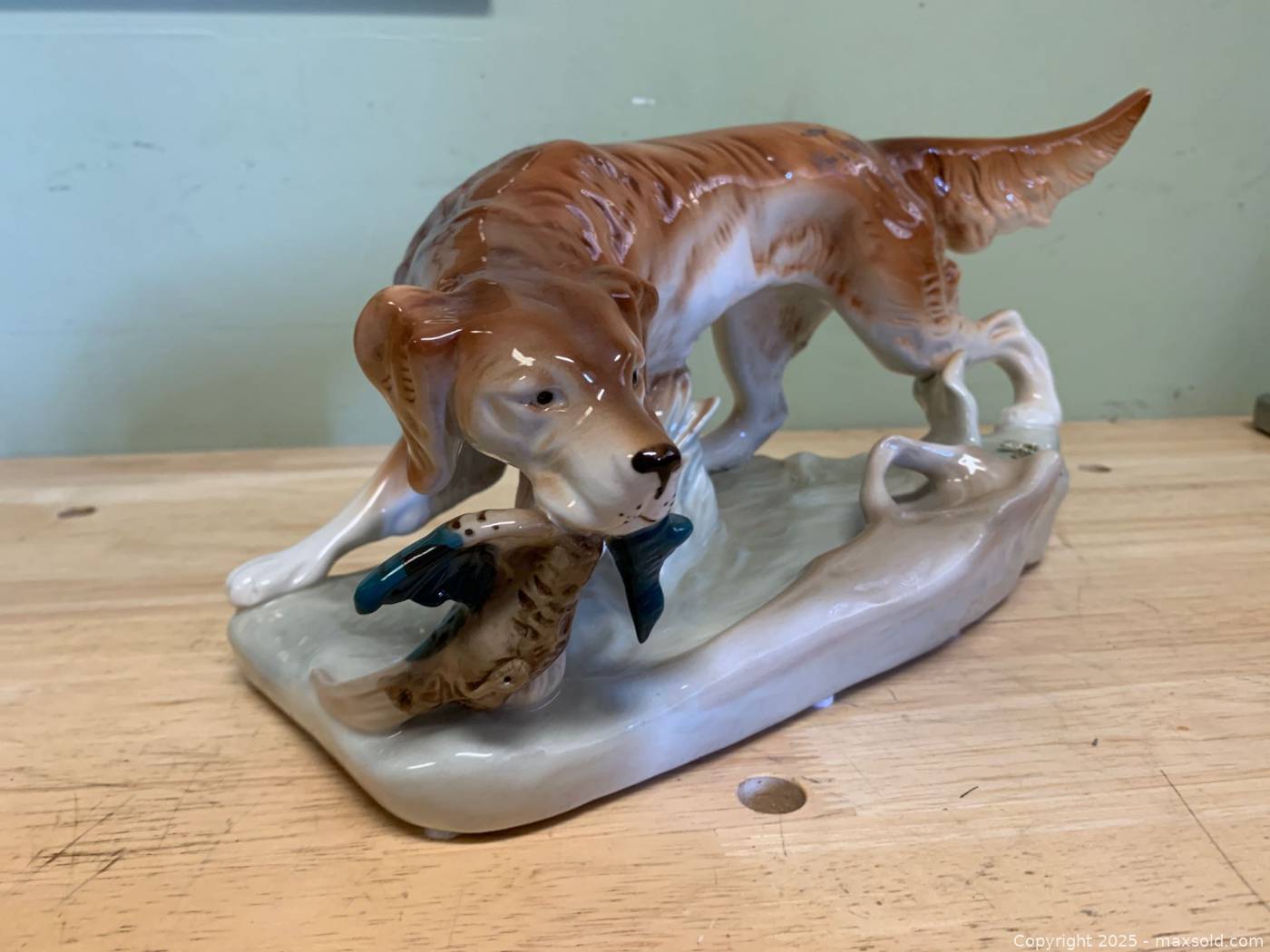 Royal Dux porcelain hunting dog retrieving duck figurine | Maxsold