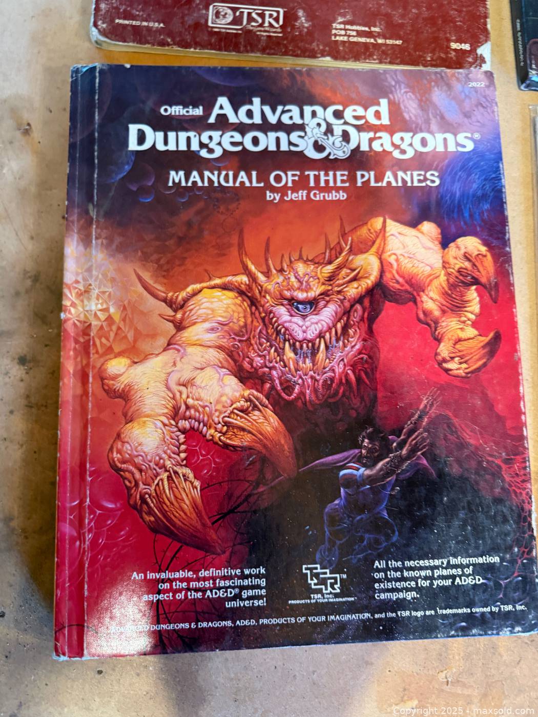 AD&D hardcovers and two Marvel comics | Maxsold
