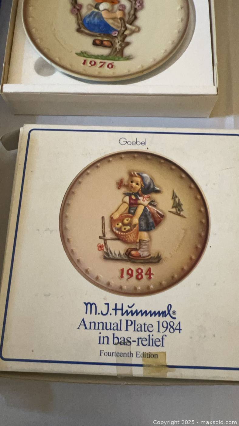 Goebel M.I. Hummel Annual Collector Plates And Wood Rack | Maxsold