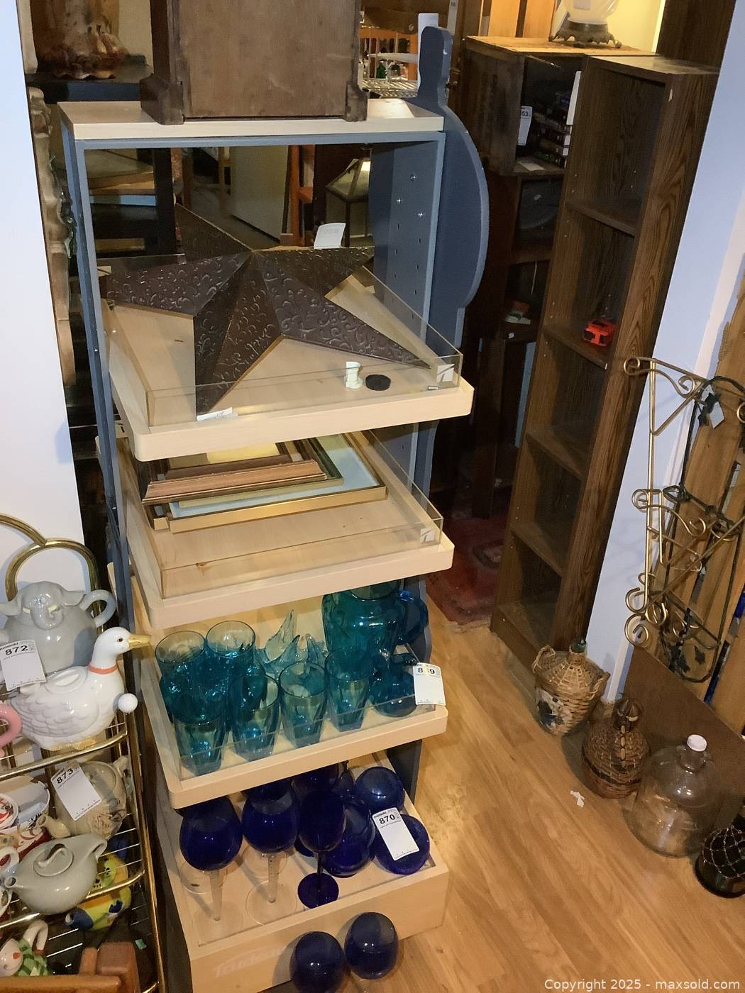 5-level wood store display on wheels | Maxsold