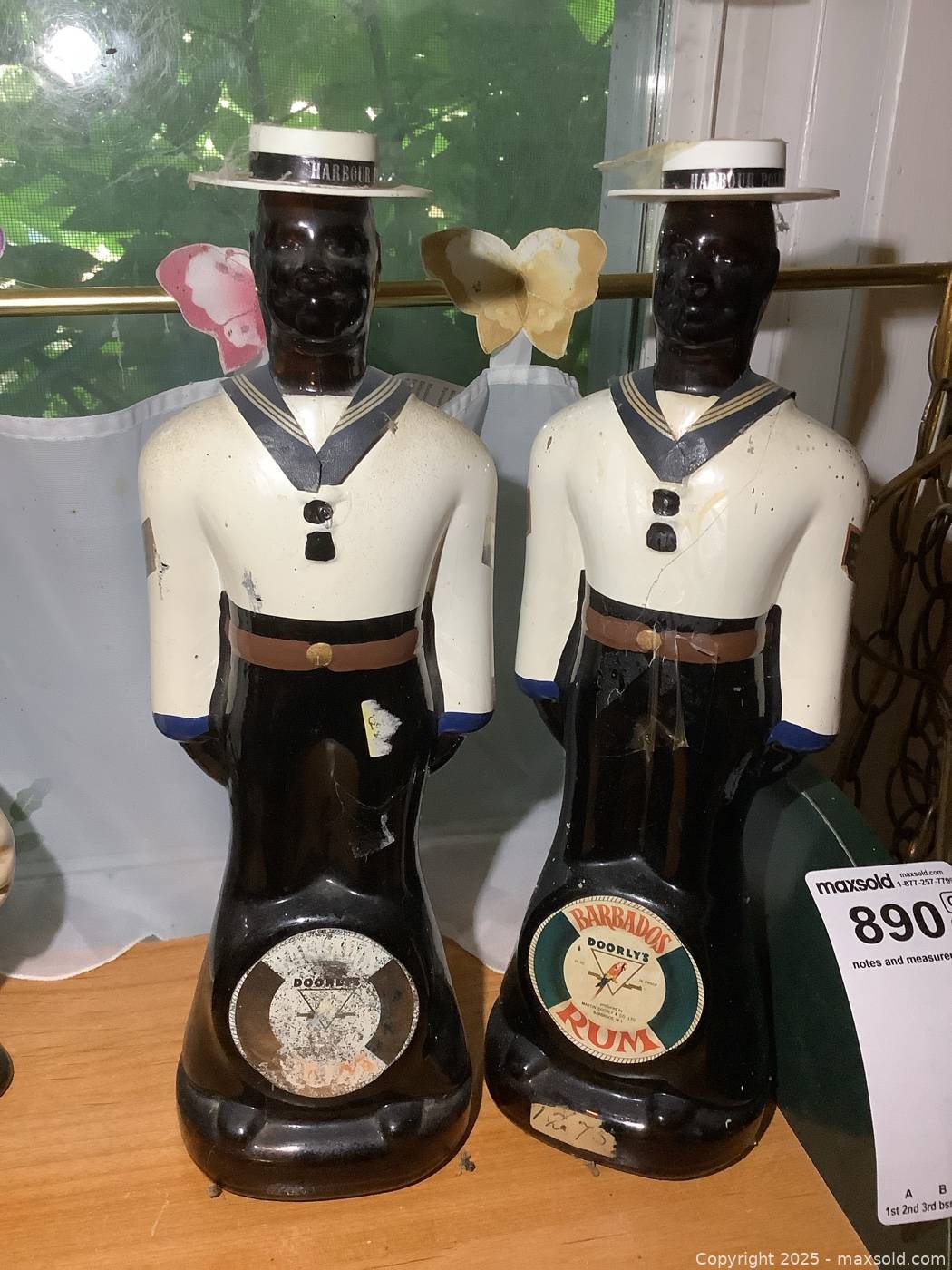 Six novelty ceramic figural liquor bottles | Maxsold
