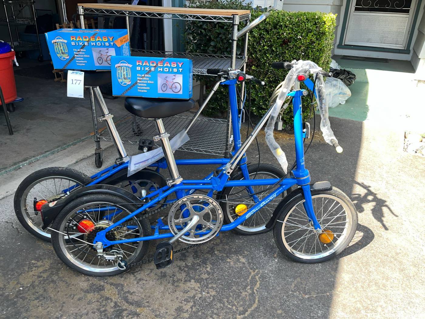 Pair Dahon StowAway folding bikes + 2 RadEasy bike hoists | Maxsold