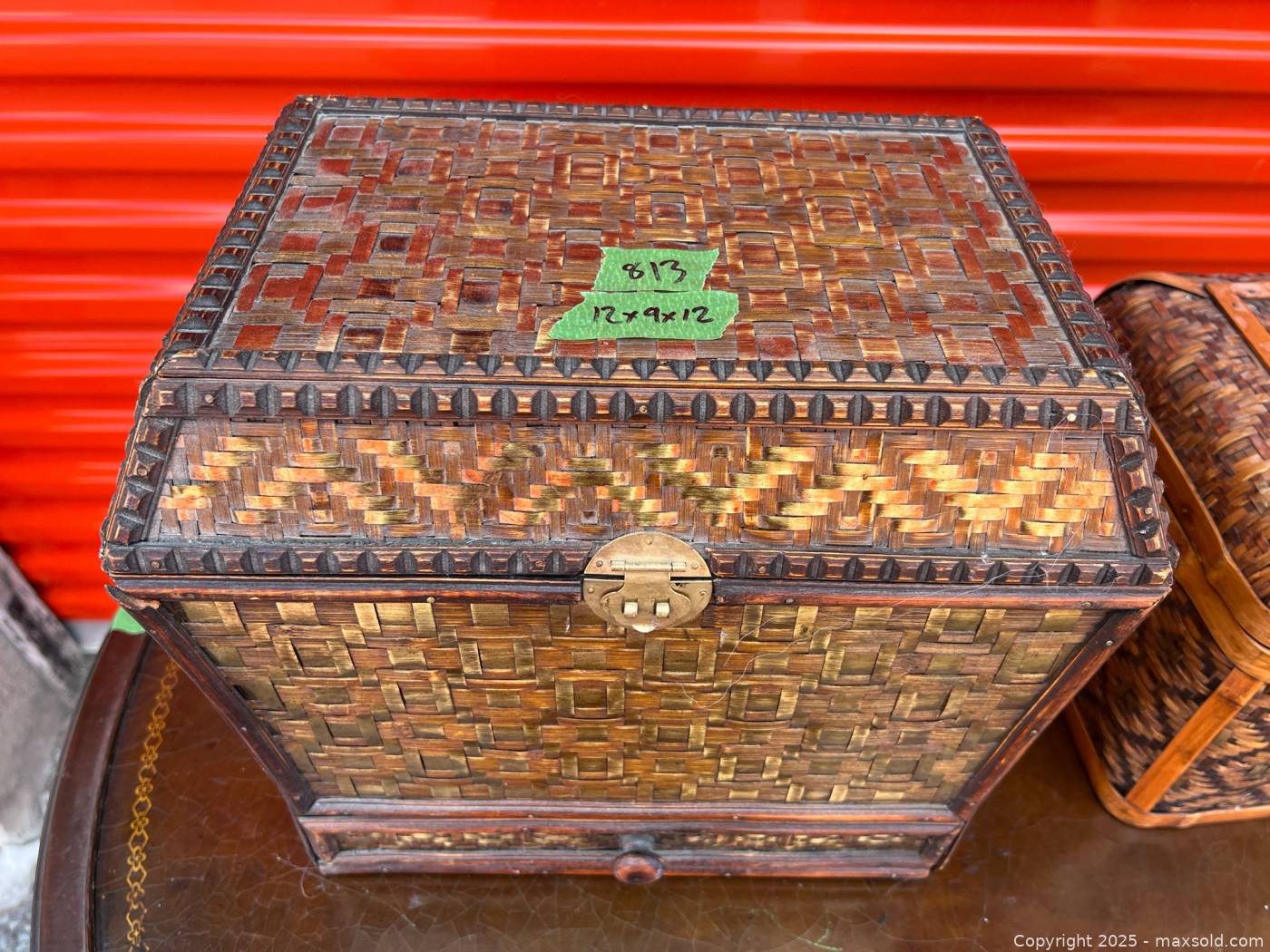 Two wicker storage boxes with latches | Maxsold