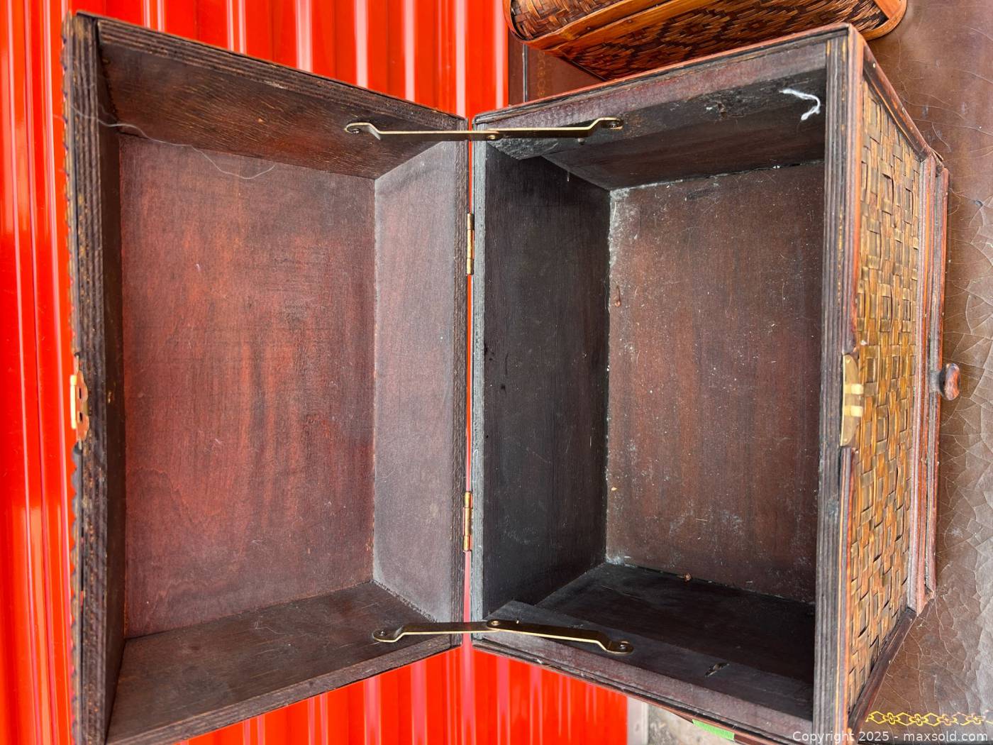 Two wicker storage boxes with latches | Maxsold