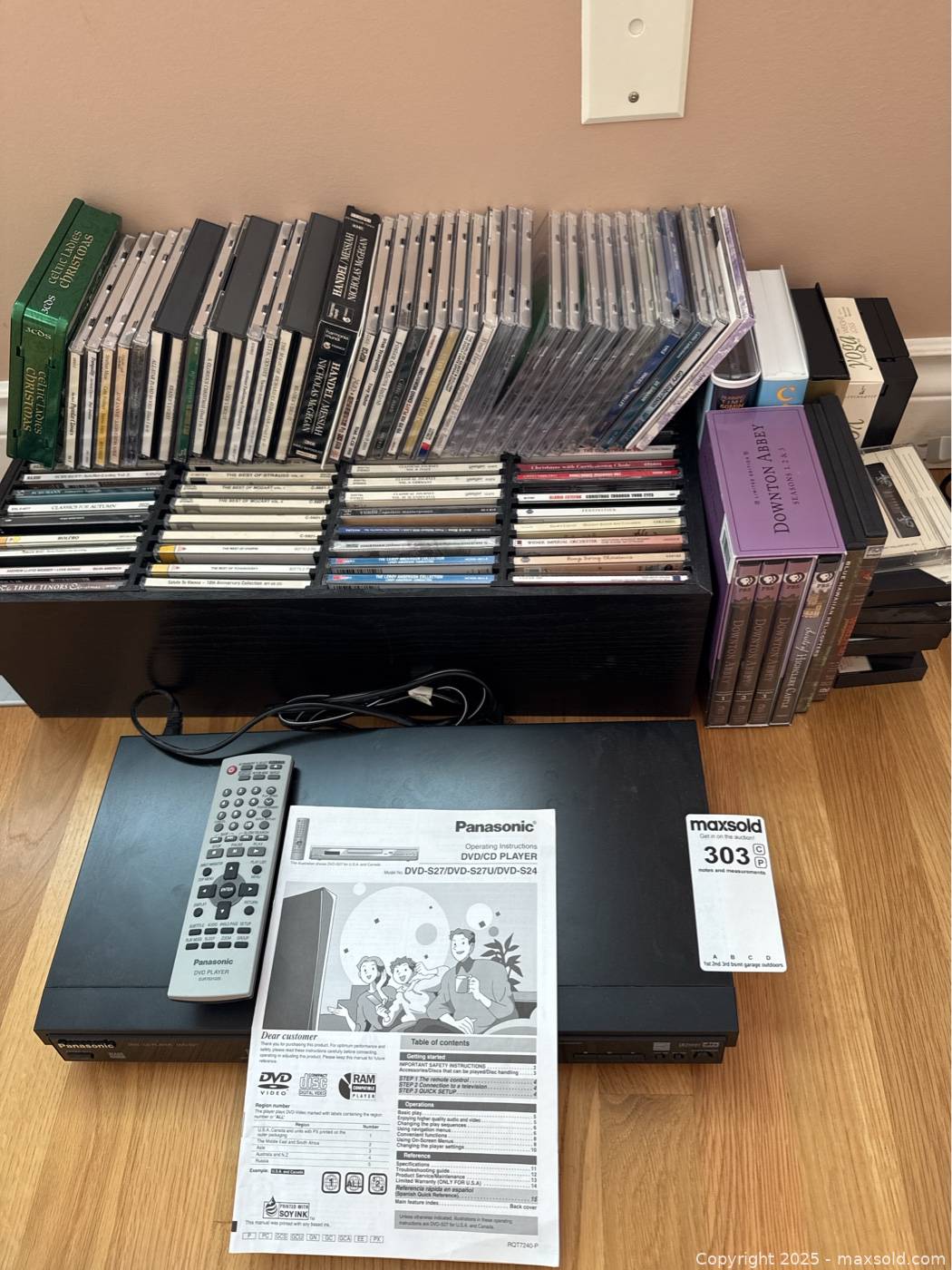 Panasonic DVD/CD player with remote, manual, ~60 CDs and DVDs | Maxsold