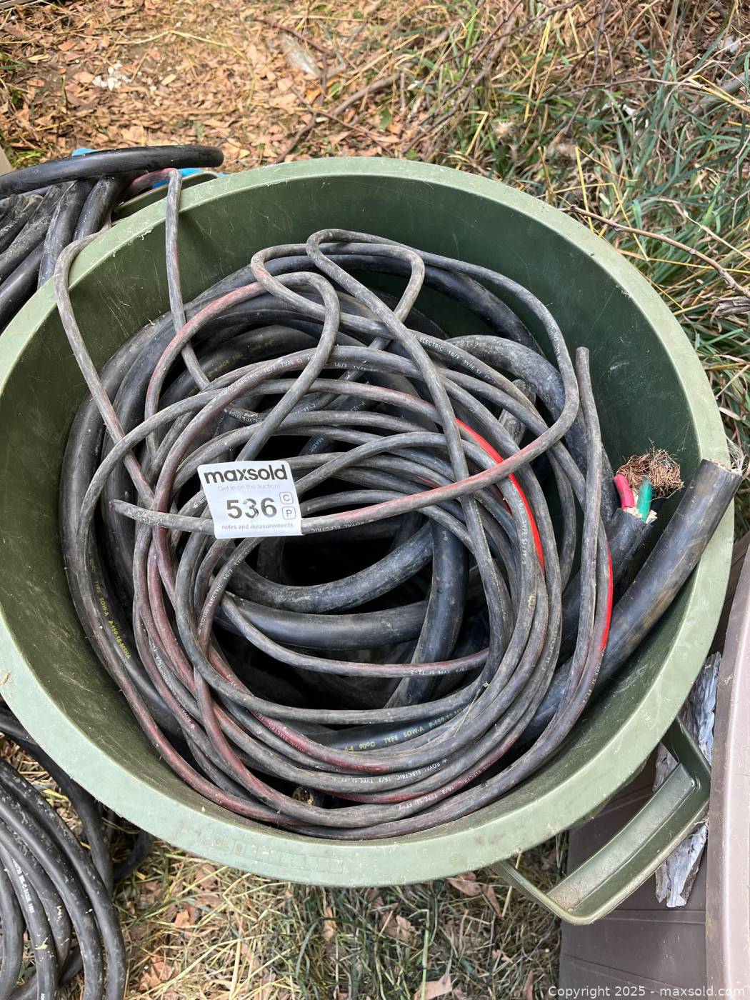 Electrical cables and three plastic garbage cans | Maxsold