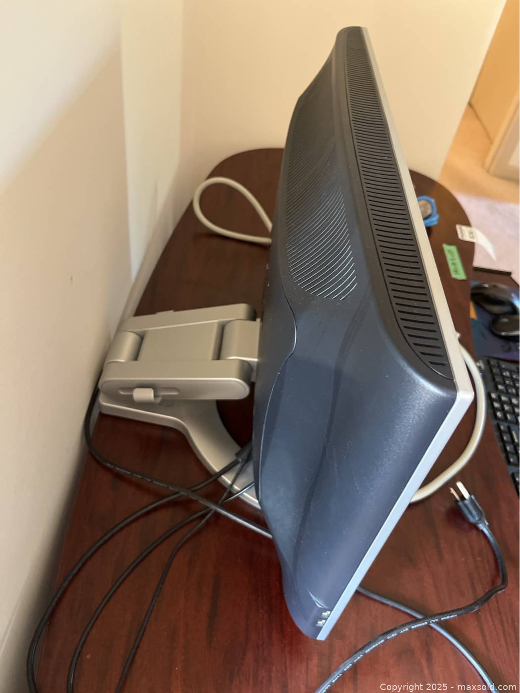 Office desk with monitor, Logitech mice, cables | Maxsold