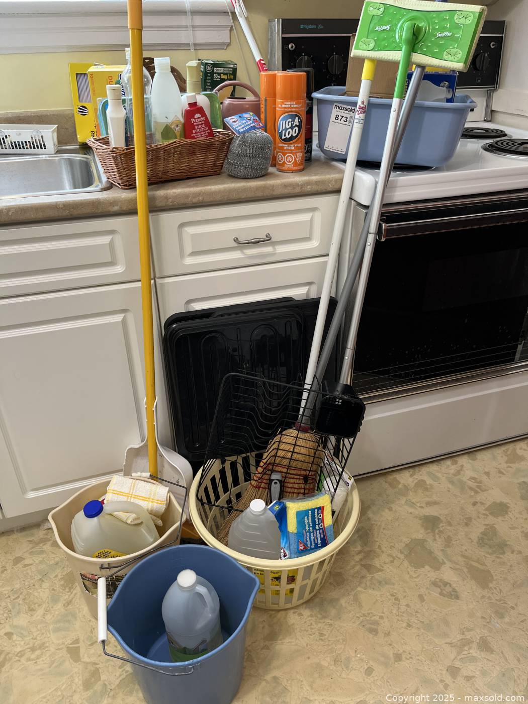 Cleaning tools, aerosols, Swiffer cloths, clothespins, jugs | Maxsold